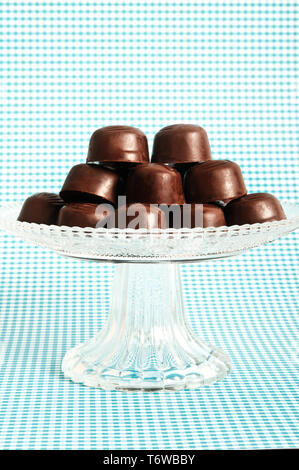 chocolate pralines on a glass stand Stock Photo - Alamy