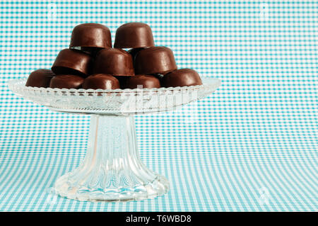 chocolate pralines on a glass stand Stock Photo - Alamy