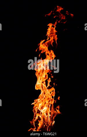 Jet flame in front of black background Stock Photo - Alamy