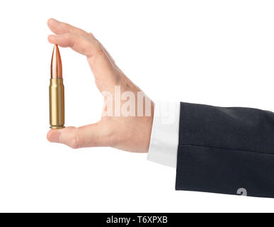 Bullet in hand Stock Photo - Alamy