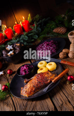 classic and crispy roasted duck with cabbage and dumplings Stock Photo ...
