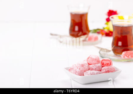 Traditional tea with turkish delights on street cafe table Stock Photo ...