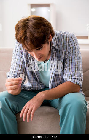 Young man committing suicide with razor blade Stock Photo - Alamy