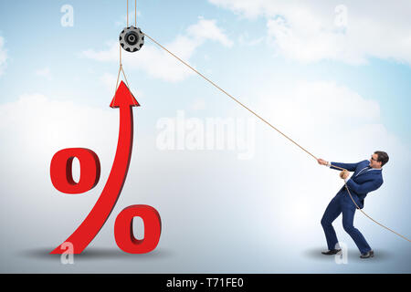 Businessman increasing interest rate in market Stock Photo - Alamy