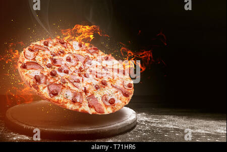 fast food pizza on fire. high quality fast food concept Stock Photo - Alamy