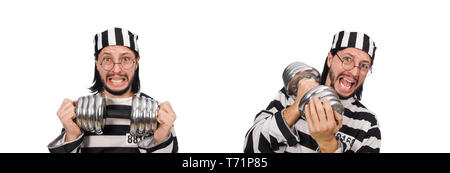 A white male prison inmate with various tattoo on his hand, holds up ...