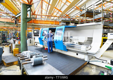 large modern cnc machine for the production of shafts for industrial ...