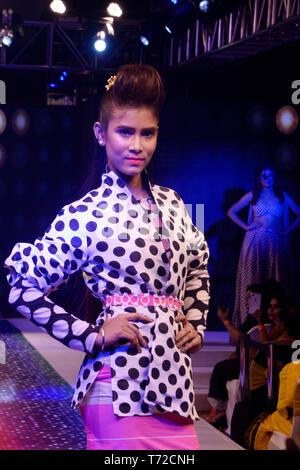 Kolkata, India. 02nd May, 2019. A model shows her hairstyle as she ...