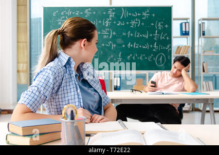 Young students taking the math exam in classroom Stock Photo - Alamy