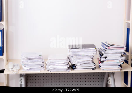 Young businessman employee unhappy with excessive work Stock Photo - Alamy