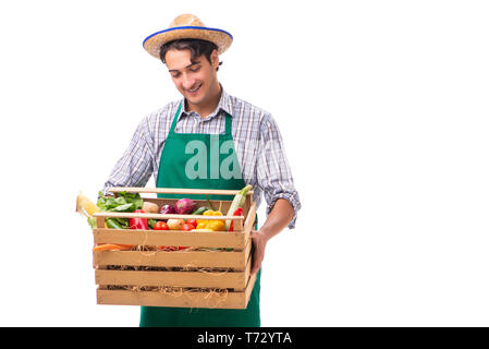 Young farmer with fresh produce isolated on white background Stock ...