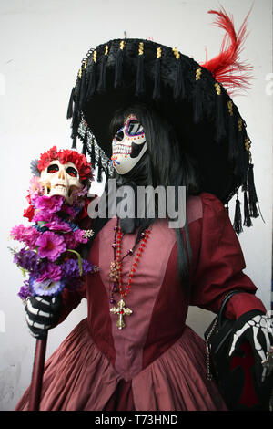 a woman characterized as Catrina pose for photo in Sao Paulo Stock ...
