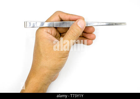 A male hand holding Tweezers, medical pinsetter, man hand isolated on ...