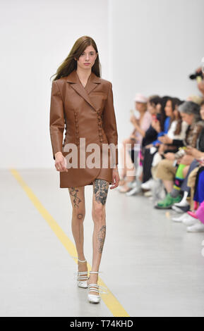 Tbilisi, Georgia. 3rd May, 2019. A model presents a creation of ...