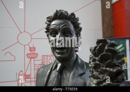 Statue of Ken Dodd with his Diddy Men and Tickling Stick inside Lime ...