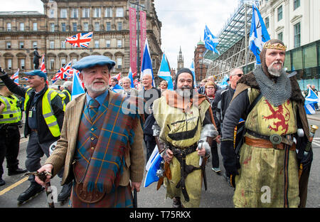 Scottish independence supporters march through Glasgow during the All ...