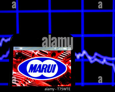 In this photo illustration a Marui Co., Ltd. logo seen displayed on a ...