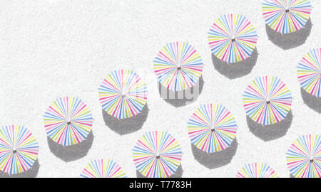 Aerial view of colorful umbrellas on sandy beach, people at sunset in ...