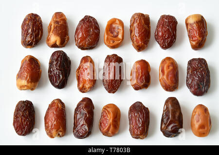Different varieties of dried dates isolated on white background Stock ...