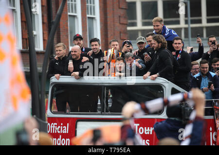Luton Town players celebrate during the victory parade at St George's ...