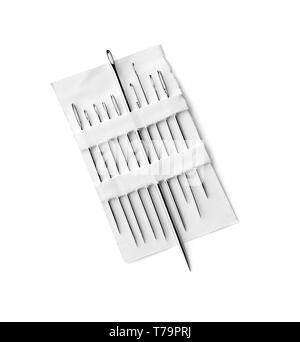 sewing needles on white background Stock Photo - Alamy