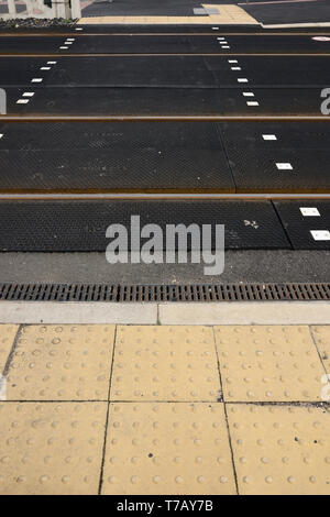 Tactile surface and Textured rubber pedestrian crossing point on ...