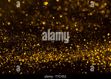 Black and golden sparkling glitter bokeh background, christmas abstract ...