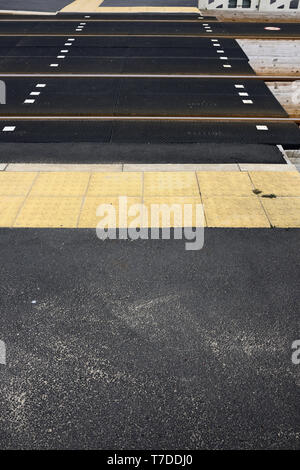 Tactile surface and Textured rubber pedestrian crossing point on ...