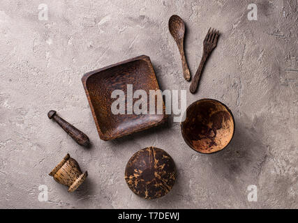 Bowls and plates made from coconut shell Stock Photo - Alamy