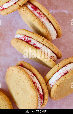 Orange and Raspberry Shortbread sandwich biscuits Stock Photo - Alamy