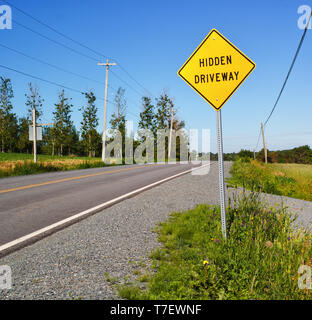 Warning sign for a hidden driveway on a curvy road. Danbury Wisconsin ...