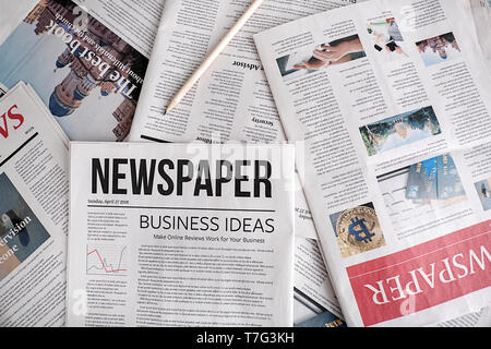 Many newspapers, top view Stock Photo - Alamy