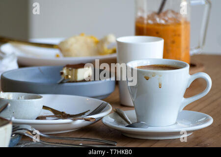 Messy dining room, table with plate and glasses after lunch Stock Photo ...