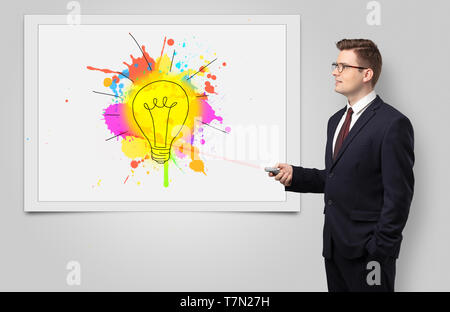Man with laser pointer presenting innovative idea Stock Photo - Alamy