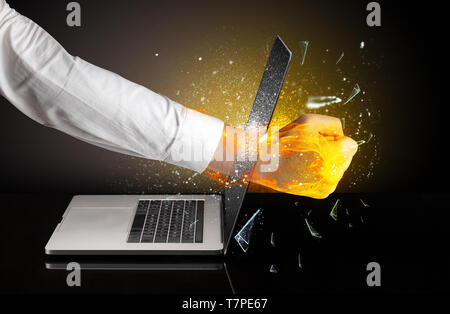 Firing hand hitting strongly laptop screen glass Stock Photo - Alamy