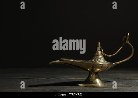 Aladdin lamp of wishes and dates for Ramadan on red background Stock ...