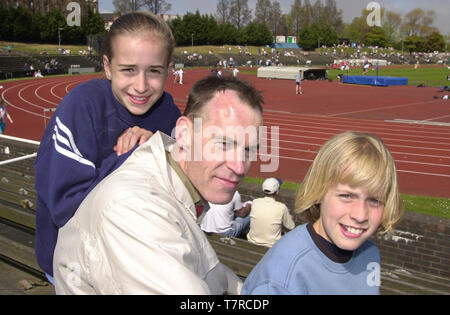Former athlete Cameron Sharp pictured with his daughters Carly, dark ...