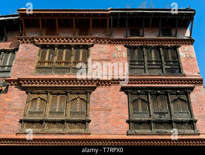 Elaborately carved wooden windows in the traditional Newar style ...