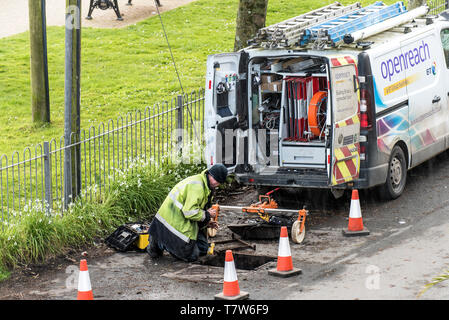 a telecoms engineer working for BT open reach telephone company working ...