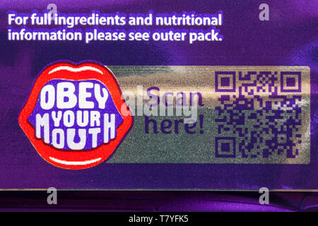 Quick response code on the back of a Cadbury's bar of chocolate Stock ...