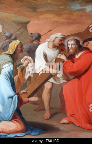 Simon de Cyrène aide Jésus à porter sa croix. Chemin de croix. Station ...