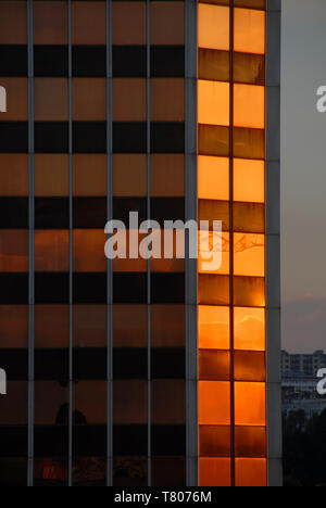 Tall building with repetitive windows Stock Photo - Alamy