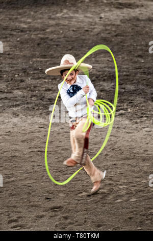 A Mexican charro practices his lasso at the National Charro ...