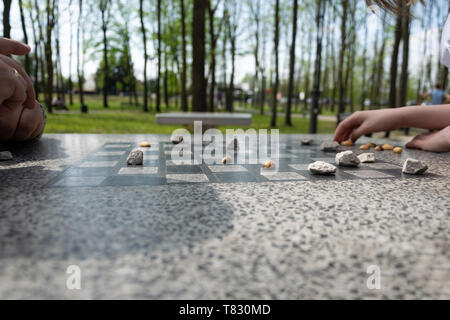 A place in the park to play in check or checkers. Outdoor fun in the ...