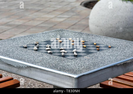 A place in the park to play in check or checkers. Outdoor fun in the ...