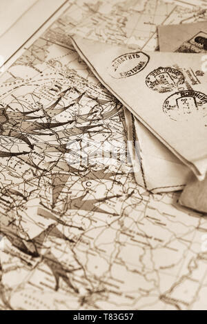 Sheaf of the paper letters of the wartime lying on the military map of ...