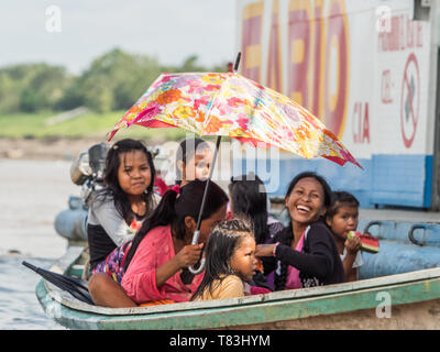 Tabatinga, Brazil - Sep 21, 2018: People on the boat from Ticuna tribe ...