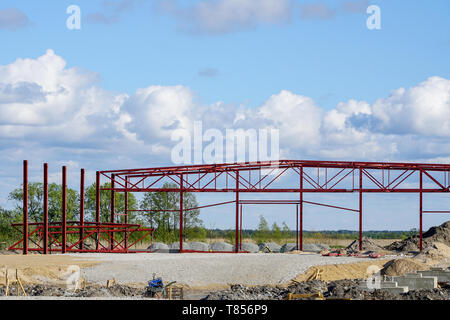 Steel frame of a new factory building under construction Stock Photo ...