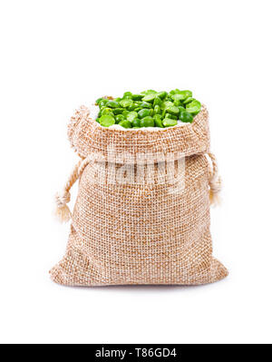 sack of split green peas on wooden table Stock Photo - Alamy
