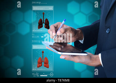 Human lungs on tablet computer Stock Photo - Alamy